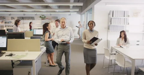 Embarrassed businessman walking into off... | Stock Video | Pond5