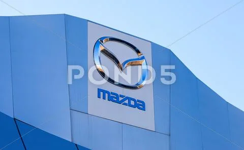 The emblem mazda on blue sky background ~ Premium Photo #37279259