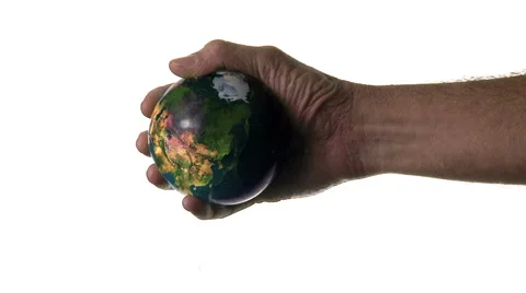 Embracing Earth: Hand Palming the Globe ... | Stock Video | Pond5