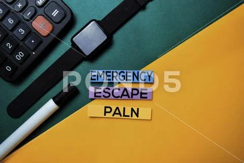 Emergency Escape Plan text on top view color table background ...