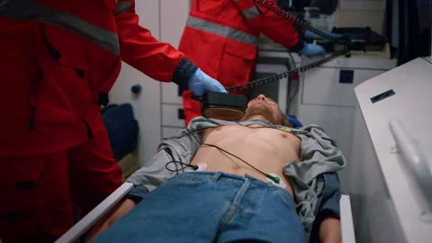 Emergency medical doctors using heart de... | Stock Video | Pond5