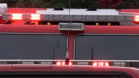 Emergency vehicles with flashing lights ... | Stock Video | Pond5