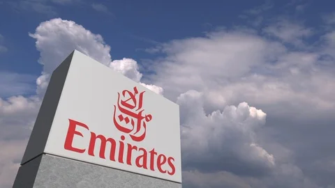 EMIRATES AIRLINES logo against sky backg... | Stock Video | Pond5