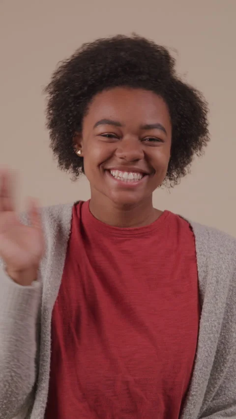 Emotions of Smile and Waving | Stock Video | Pond5