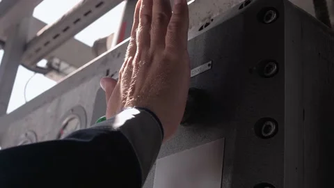 Employee hits the big red button on the ... | Stock Video | Pond5