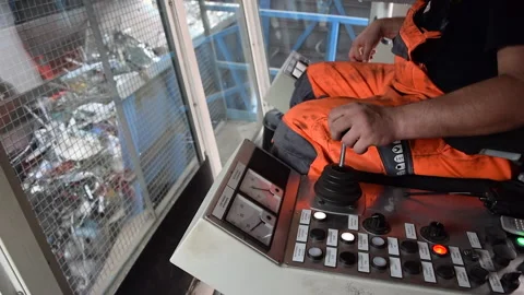 An employee loading scrap metal loading ... | Stock Video | Pond5