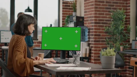 Employee looking at horizontal green scr... | Stock Video | Pond5