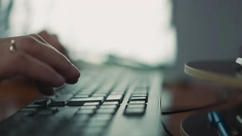 Employee presses Enter on computer keybo... | Stock Video | Pond5