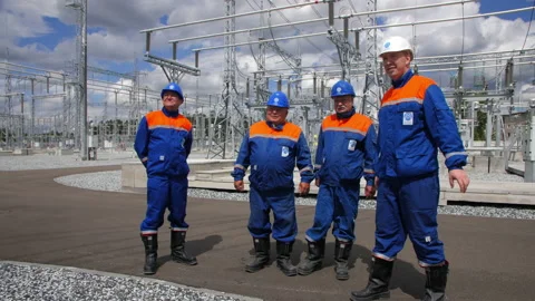 Employees look at electricity production... | Stock Video | Pond5