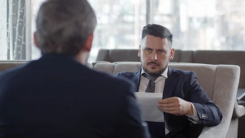 Employer Reading CV during Job Interview | Stock Video | Pond5