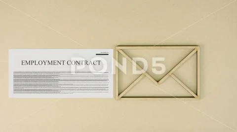 Employment contract and the envelope icon on cardboard background Stock ...