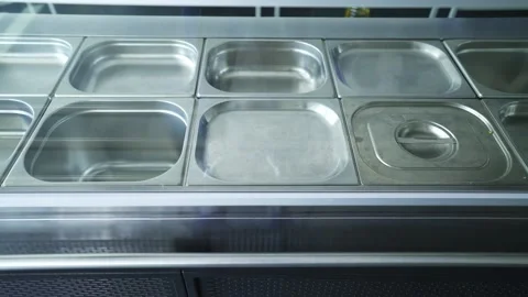 Empty buffet trays. Empty counter of caf... | Stock Video | Pond5