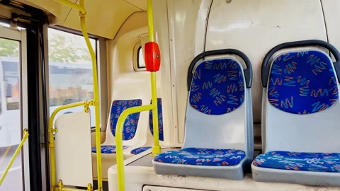 empty bus seats in bus traffic at sunset | Stock Video | Pond5