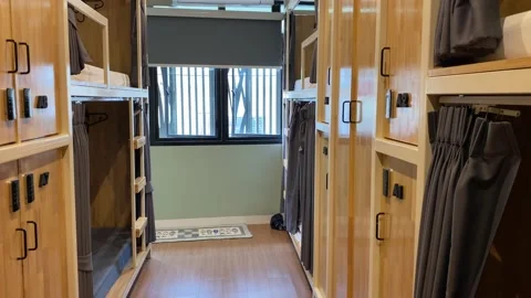 Empty clean hostel room with bunk beds a... | Stock Video | Pond5