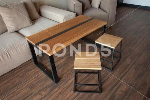 Empty coffee table over defocused coffee shop background with copy ...