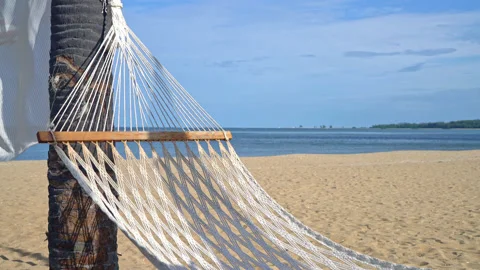empty cradle with sea beach background | Stock Video | Pond5