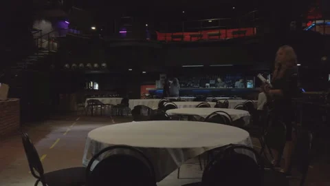 An empty dark rock bar with a stage, a b... | Stock Video | Pond5