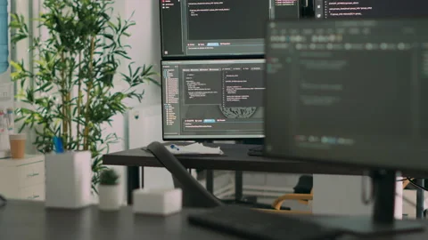 Empty desk with multiple monitors displa... | Stock Video | Pond5