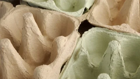 Empty egg cardboard cartons close up rot... | Stock Video | Pond5