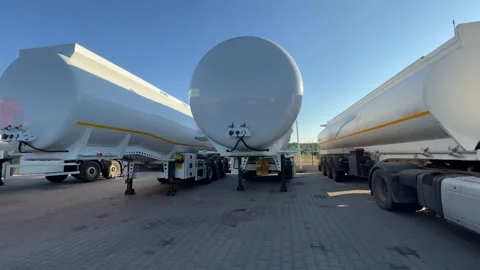 Empty fuel tanks stand in the parking lo... | Stock Video | Pond5