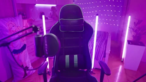 Empty gaming chair in pink girl room wit... | Stock Video | Pond5