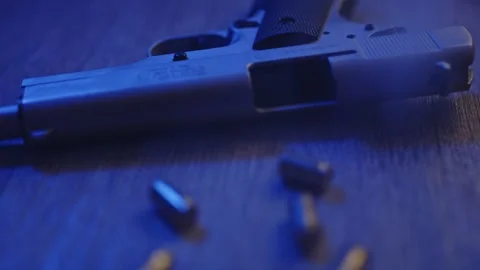 Empty gun in a smoke filled room with fl... | Stock Video | Pond5