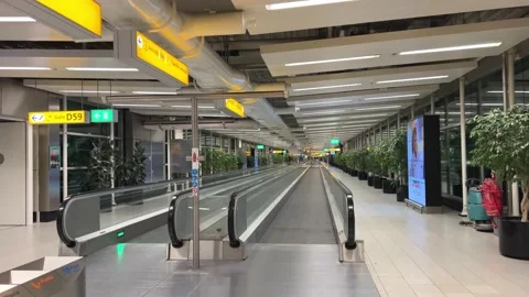 an empty hall at the airport in Amsterda... | Stock Video | Pond5