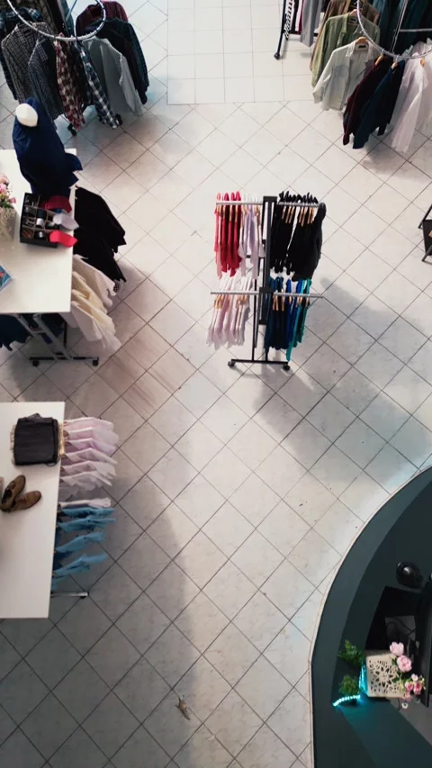 Empty mall store with stylish clothes | Stock Video | Pond5