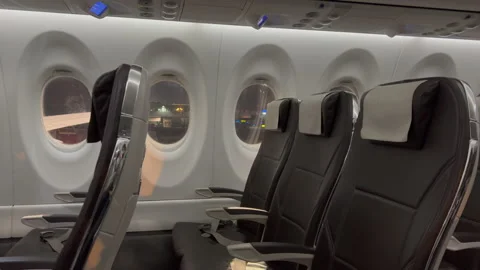 Empty passenger seats inside airplane ca... | Stock Video | Pond5