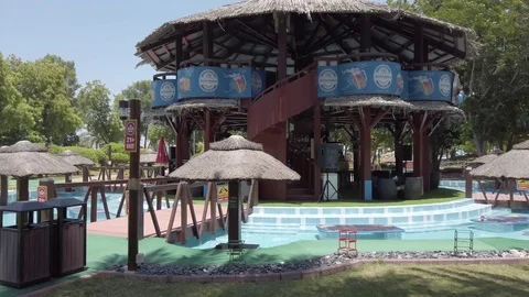Empty Pool Bar with umbrellas at a water... | Stock Video | Pond5