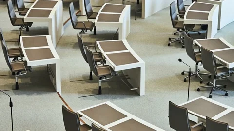 Empty row of chairs with work tables in ... | Stock Video | Pond5