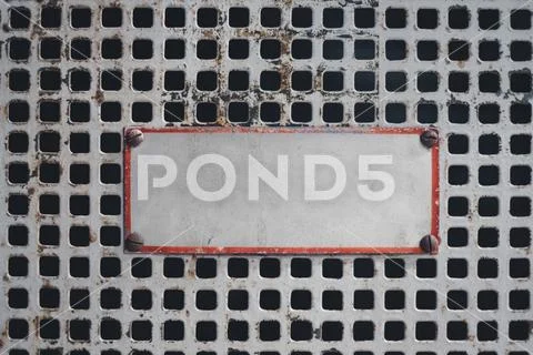 Photograph: Empty sign on rusty grid , blank sign on metal door #79018817
