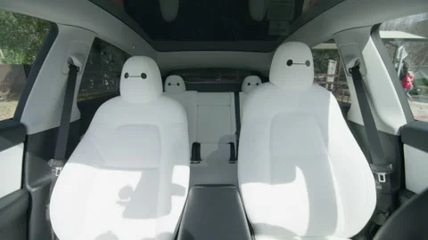 Empty Tesla Model Y car self driving usi... | Stock Video | Pond5