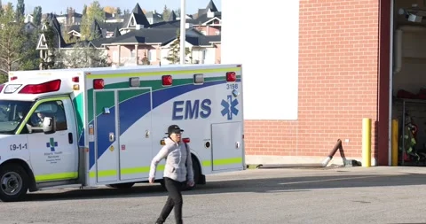 An EMS Alberta ambulance responding to a... | Stock Video | Pond5