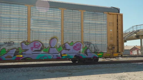 End of freight train of enclosed autorac... | Stock Video | Pond5