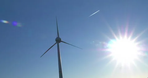 Energy - wind turbine, sun, jet aircraft... | Stock Video | Pond5
