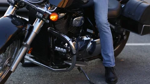 Engine and the Legs of a Biker on a Moto... | Stock Video | Pond5