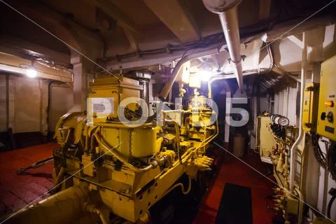 Engine Room on a cargo boat ship interior, ship's engine heavy ...