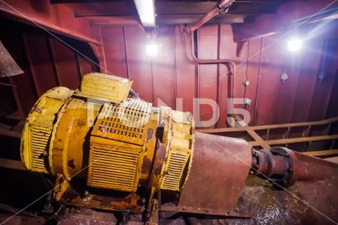 Engine Room on a cargo boat ship interior, ship's engine heavy ...