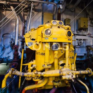 Engine Room on a cargo boat ship interior, ship's engine heavy ...