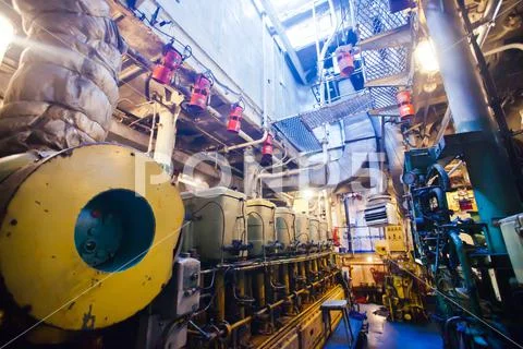 Photograph: Engine Room on a cargo boat ship interior, ship's engine ...
