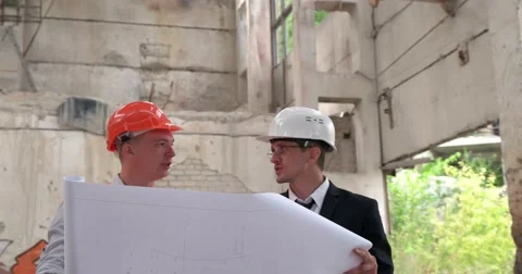 Engineer at a construction site with blu... | Stock Video | Pond5