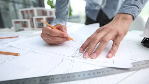 Engineer designs works according to draw... | Stock Video | Pond5