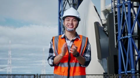 Engineer Smiling And Clapping His Hands ... | Stock Video | Pond5