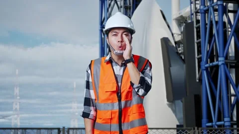 Engineer Yelling With Hand Over Mouth Wi... | Stock Video | Pond5