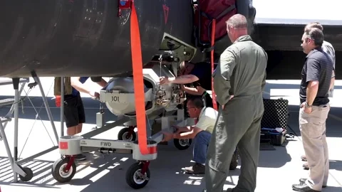 Engineers remove Optical Bar Camera from... | Stock Video | Pond5