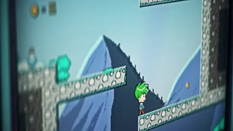 Enjoying the classic arcade platformer s... | Stock Video | Pond5