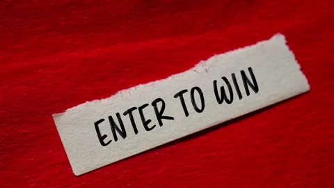 Enter to win message writing on ripped t... | Stock Video | Pond5