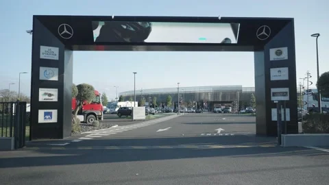 Entrance gate to the Mercedes dealership... | Stock Video | Pond5