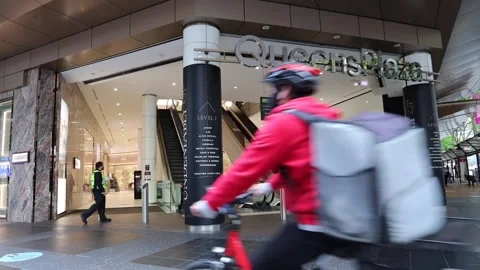 The entrance of Queens Plaza Mall in Bri... | Stock Video | Pond5